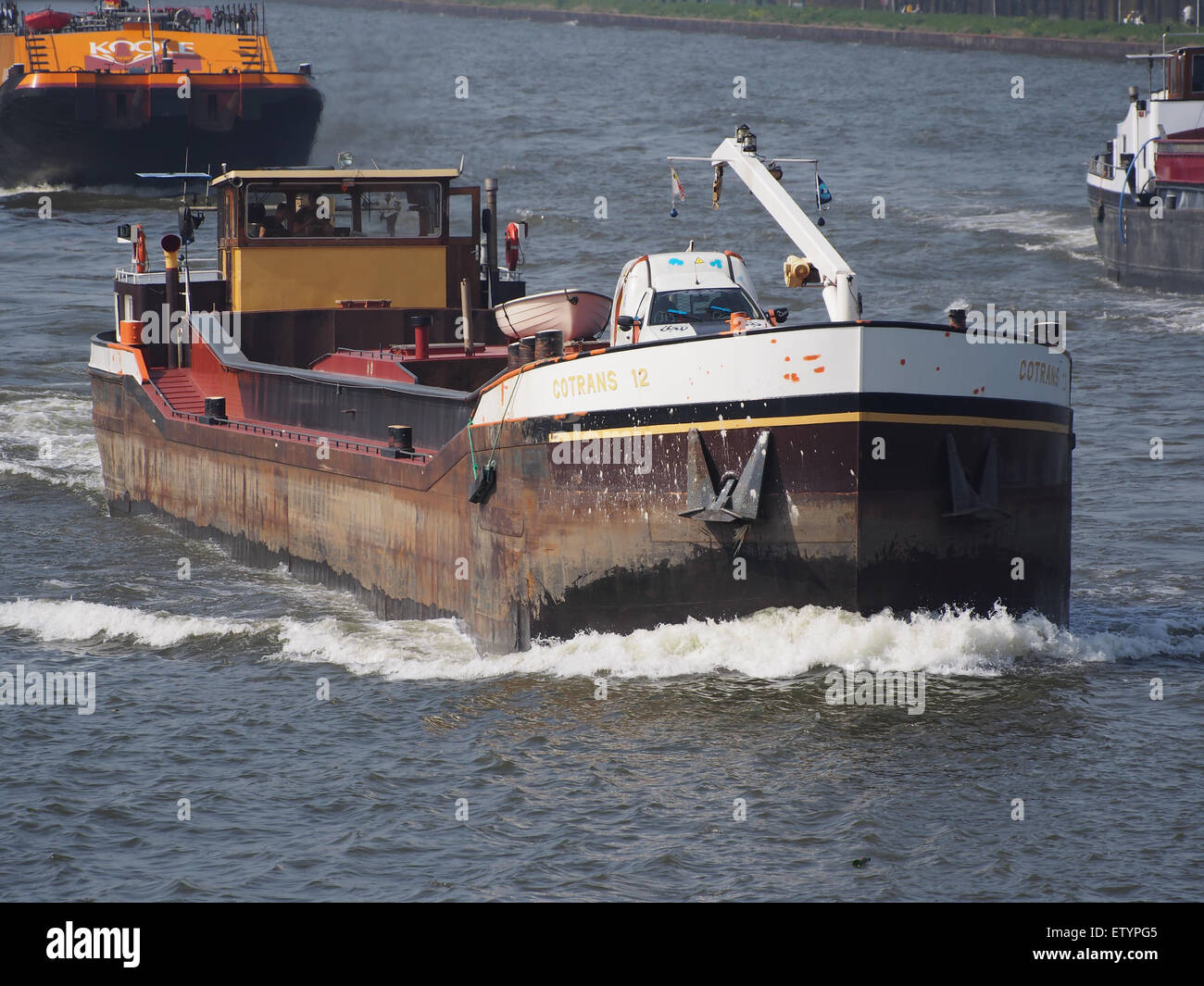 A vessel in the Amsterdam-Rijnkanaal, shown here as part of a cargo ...