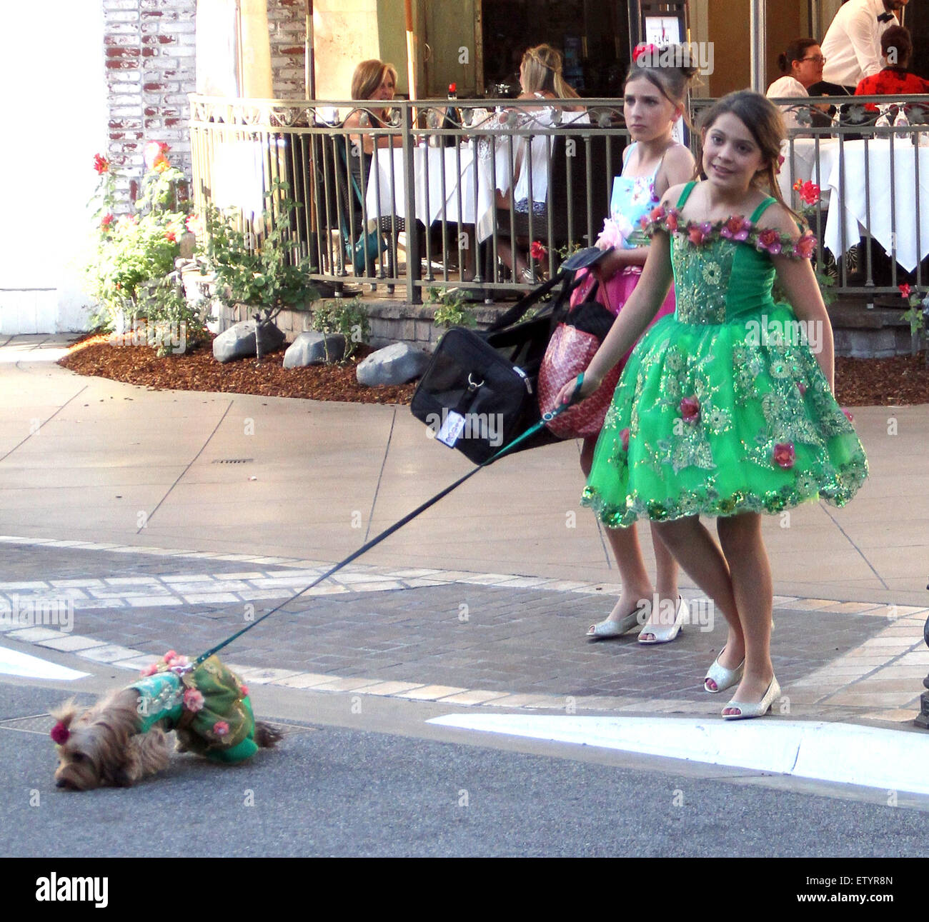 Child actress, Laura Ann Kesling all dressed up, takes her dog in ...