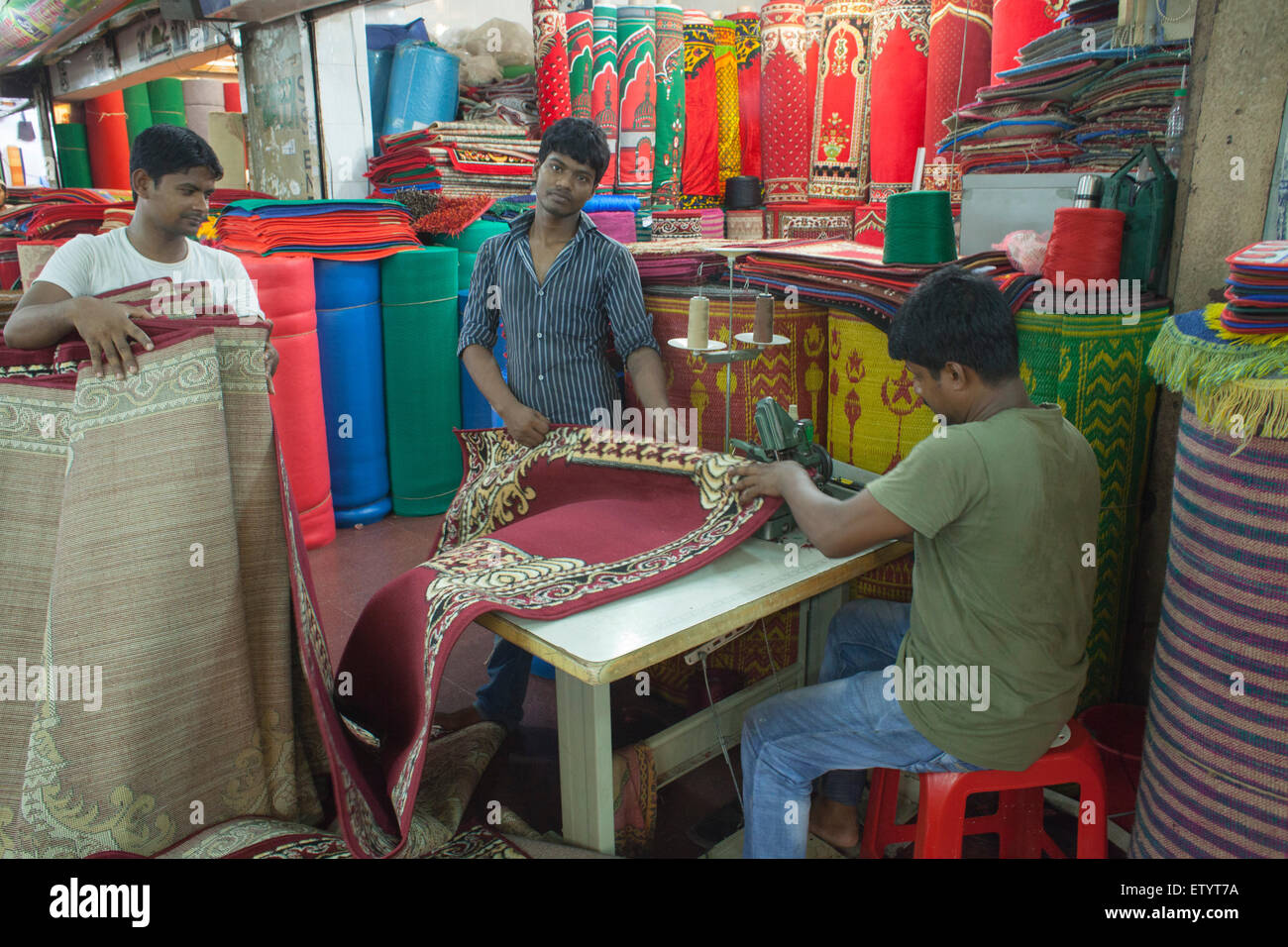 Dhaka, Bangladesh. 16th June, 2015. Prayer mats are decorated in stall ...