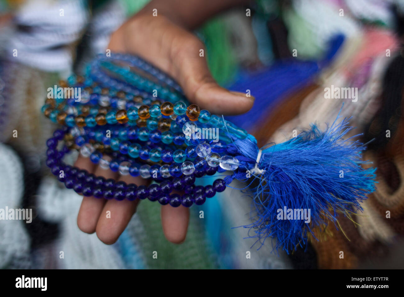 Dhaka, Bangladesh. 16th June, 2015. A saller decorated his stall with ...