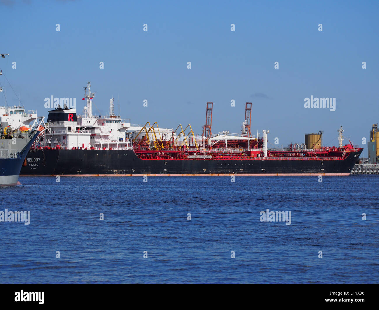 The vessel 'Melody,' identified by IMO number 9476135, is a container ...