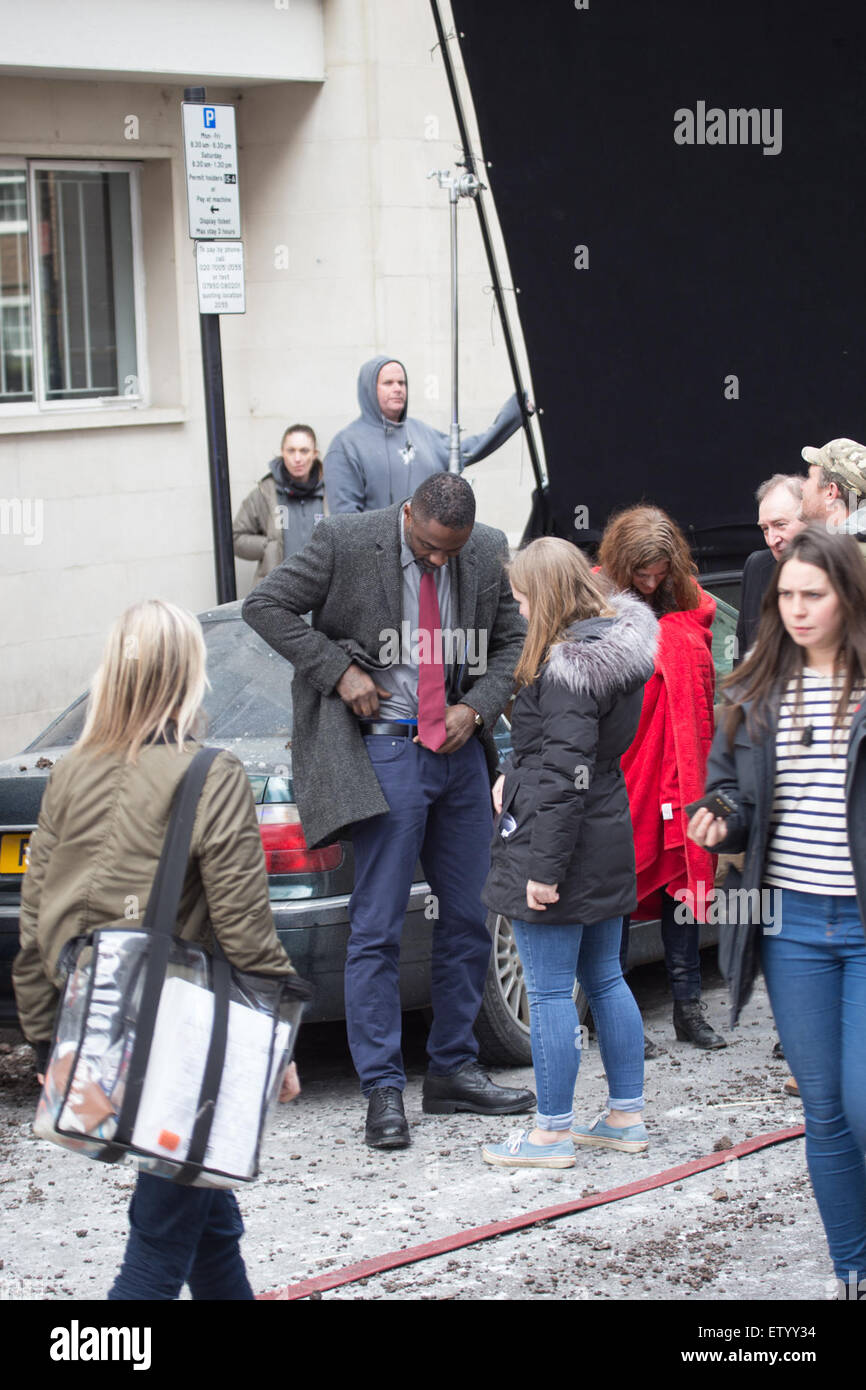 Idris Elba filming in the aftermath of an explosion. Featuring: Idris ...
