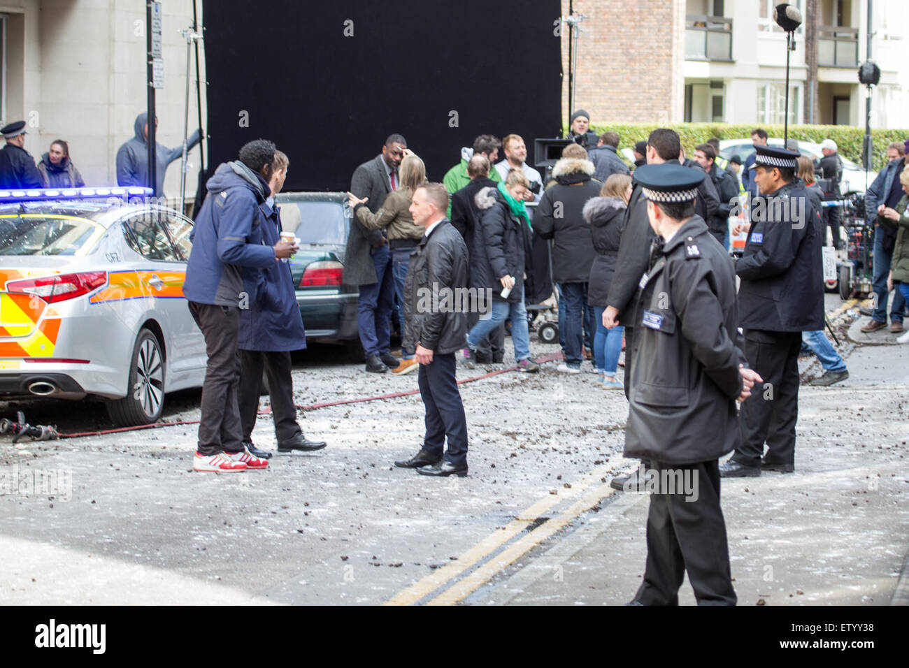 Idris Elba filming in the aftermath of an explosion. Featuring: Idris ...