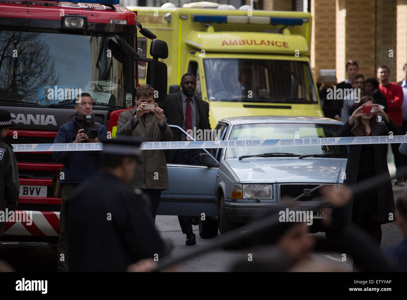 Idris Elba filming in the aftermath of an explosion. Featuring: Idris ...
