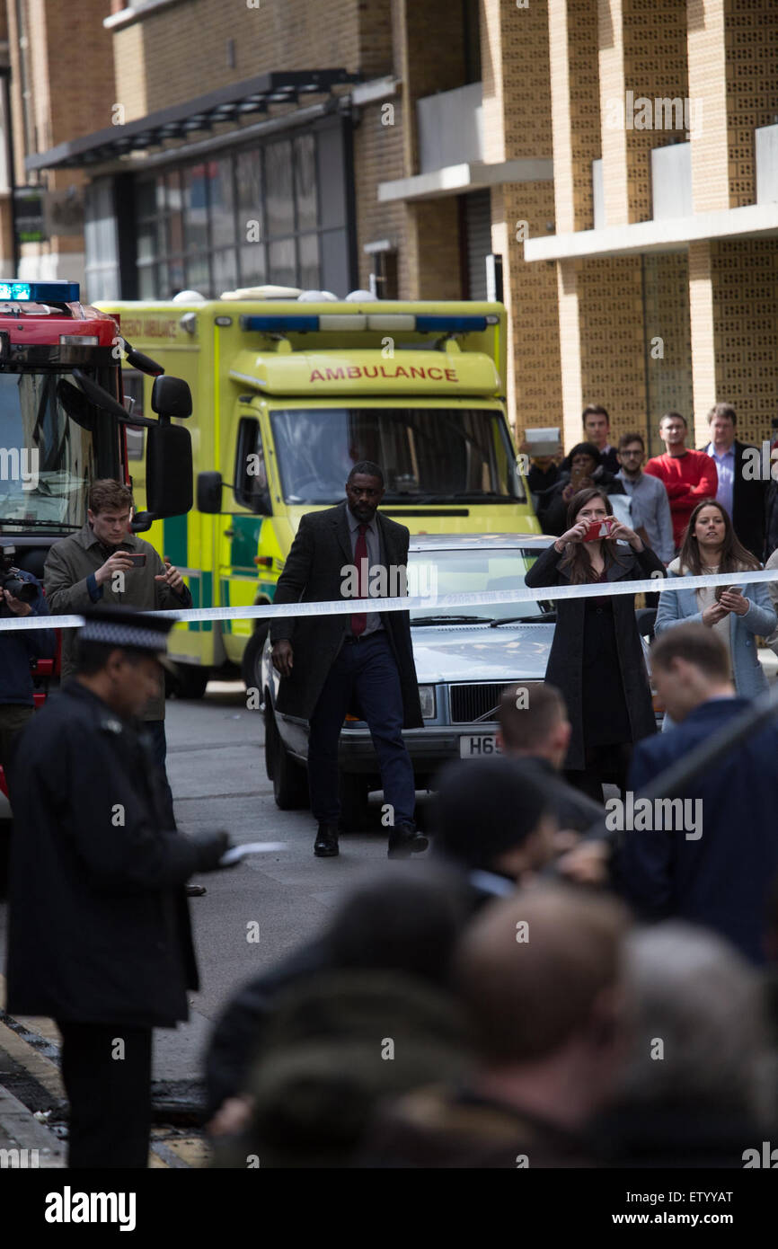 Idris Elba filming in the aftermath of an explosion. Featuring: Idris ...