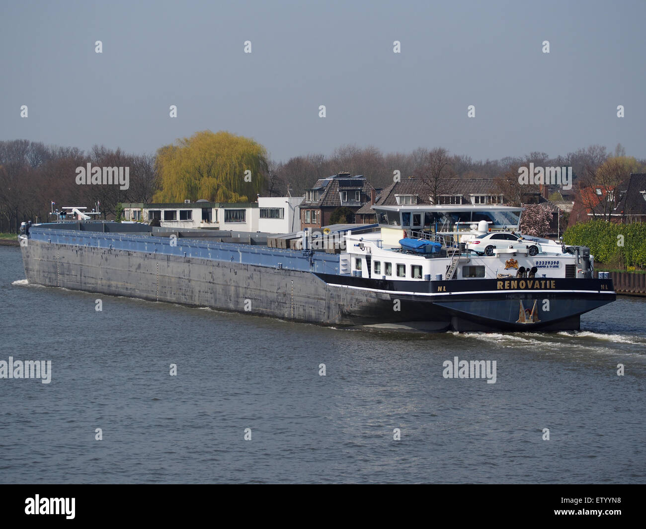The image captures the renovation of a boat or ship on the Amsterdam ...