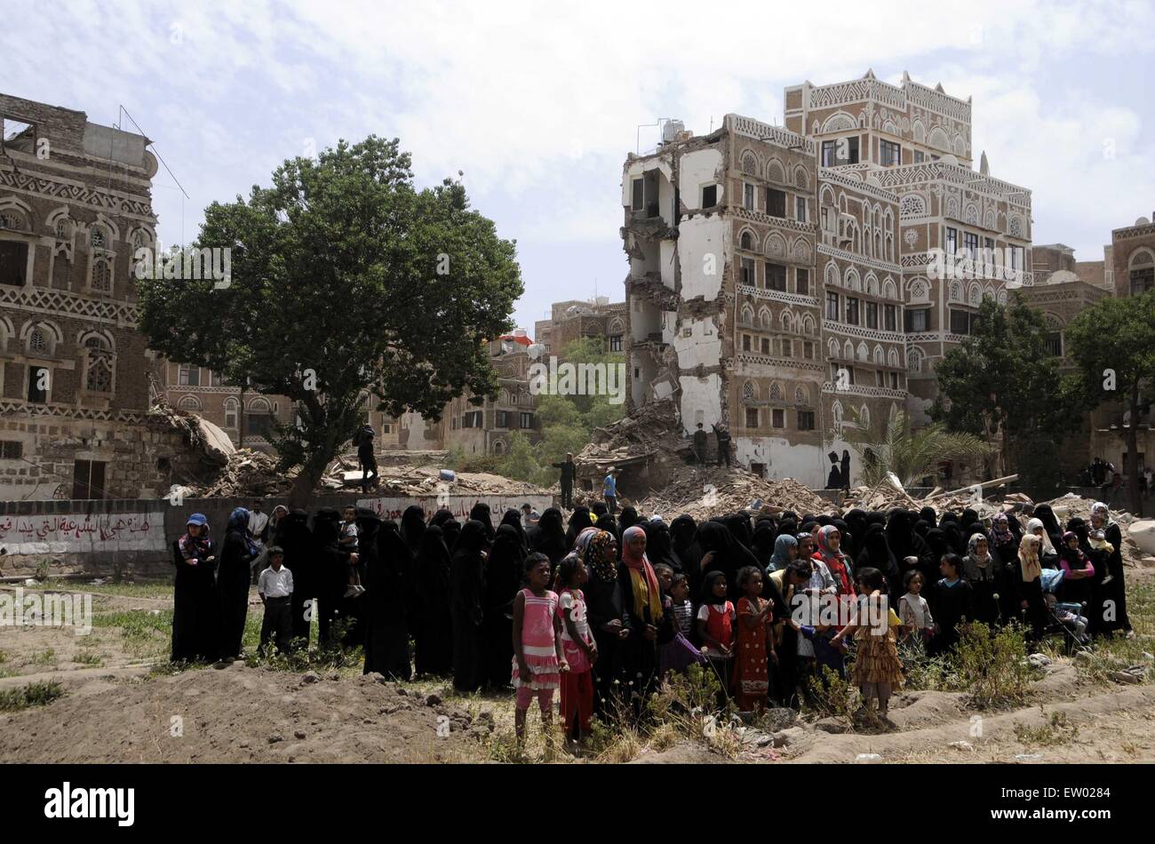 Sanaa. 16th June, 2015. Yemeni women and children gather at the Old ...