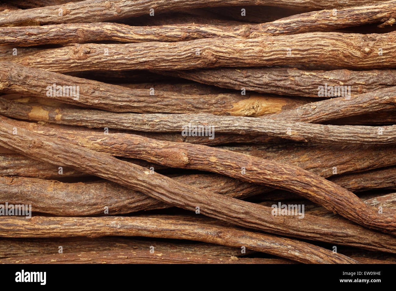 Liquorice root pieces as an abstract background texture Stock Photo - Alamy