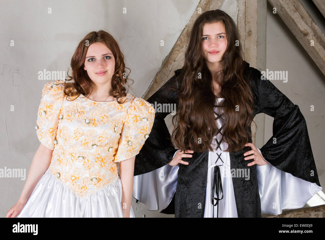 young women dressed as princess and witch Stock Photo - Alamy
