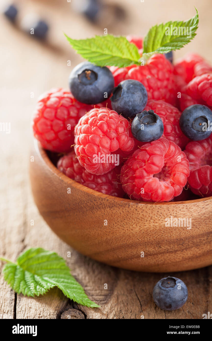 fresh berries raspberry blueberry in wooden bowl Stock Photo - Alamy