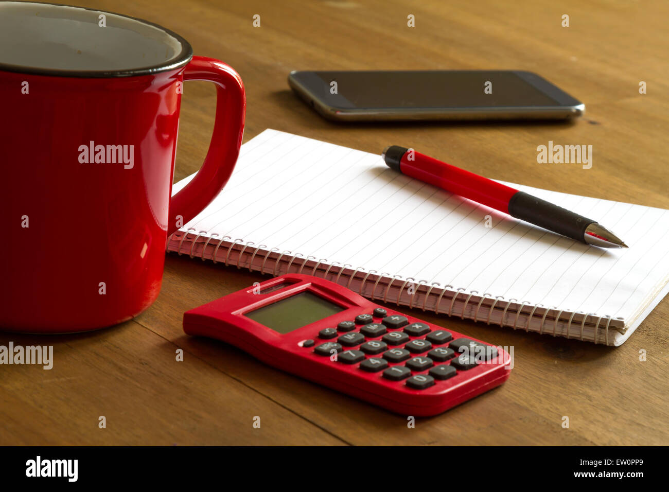 Working, taking notes and doing calculations Stock Photo - Alamy