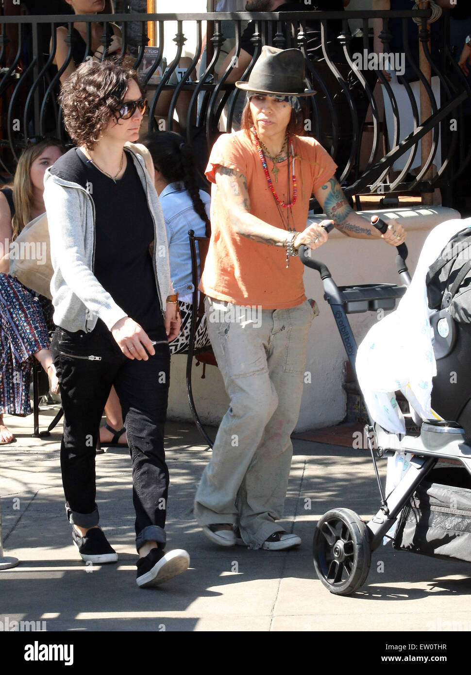 Sara Gilbert and wife Linda Perry take their newborn son Rhodes on a ...