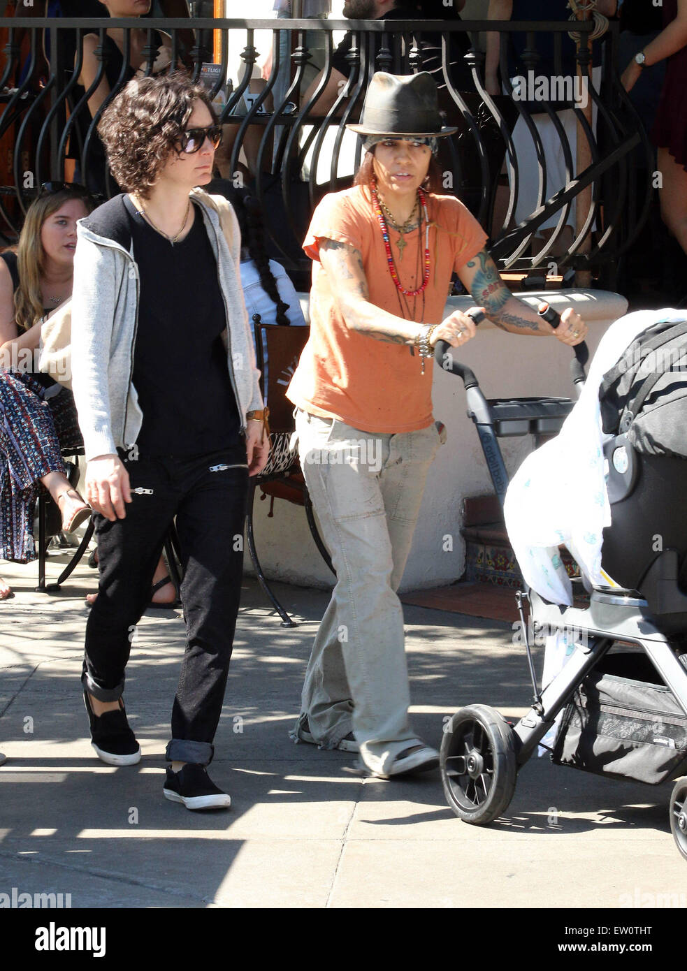 Sara Gilbert and wife Linda Perry take their newborn son Rhodes on a ...