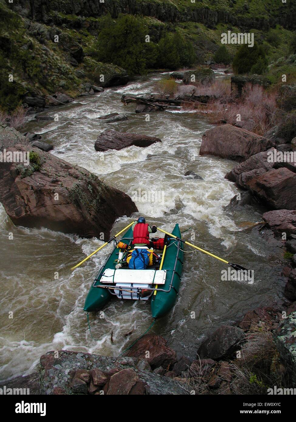 A rafter navigates one of the many rapids along the Snake River in the ...
