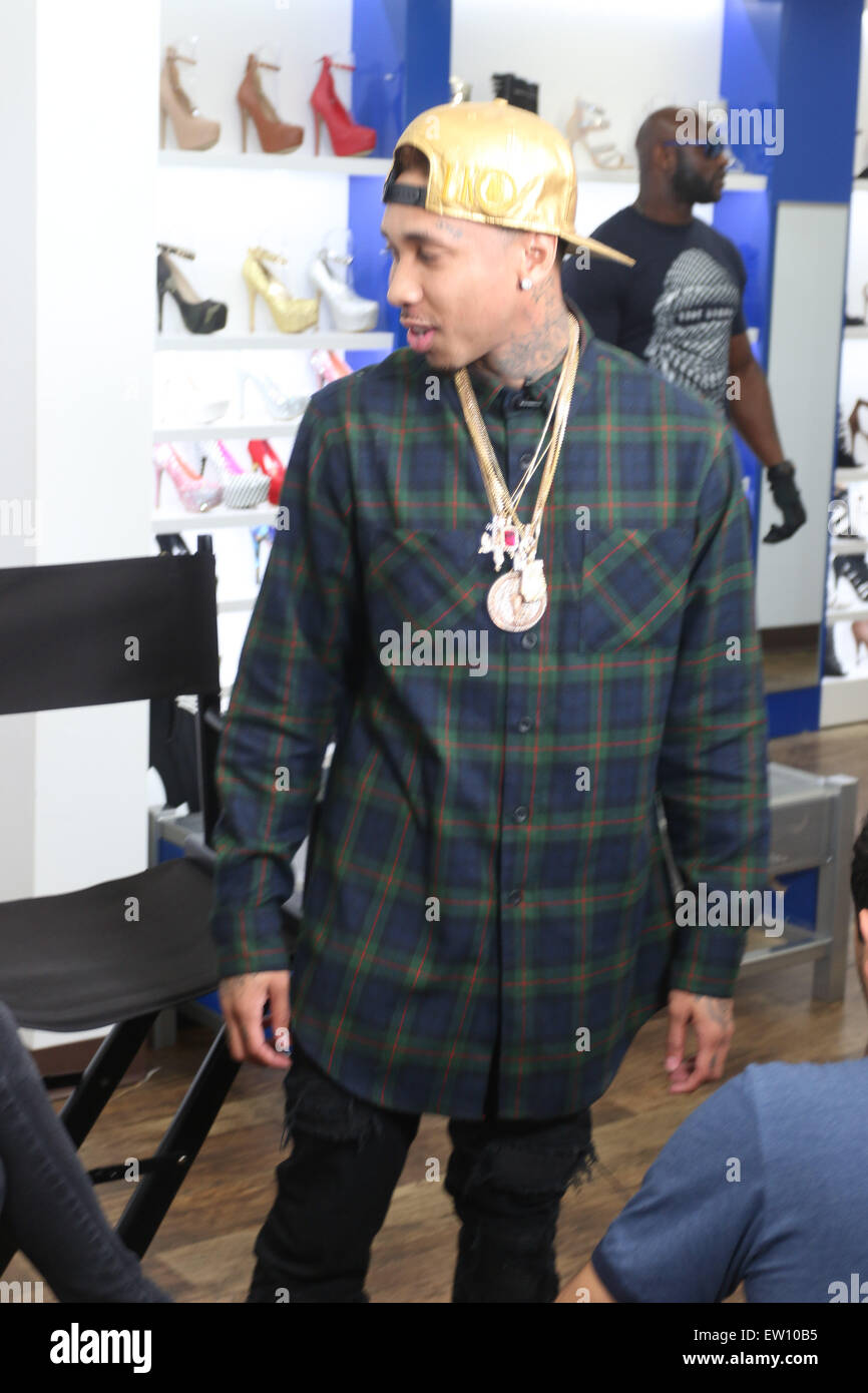 Rapper Tyga out and about with his boys in West Hollywood and shopping ...