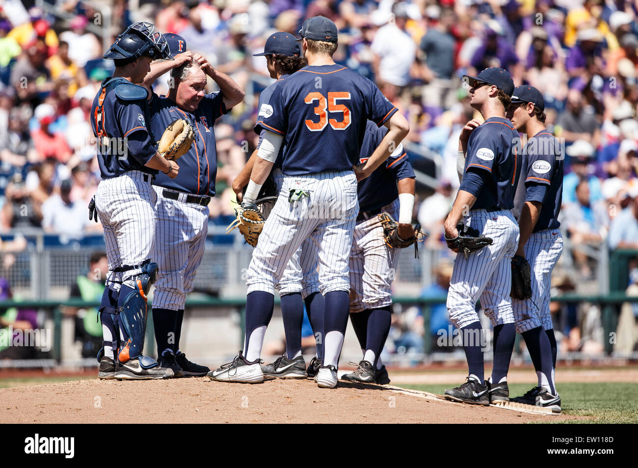 June 16, 2015: CSU Fullerton head coach Rick Vanderhook makes a mound ...