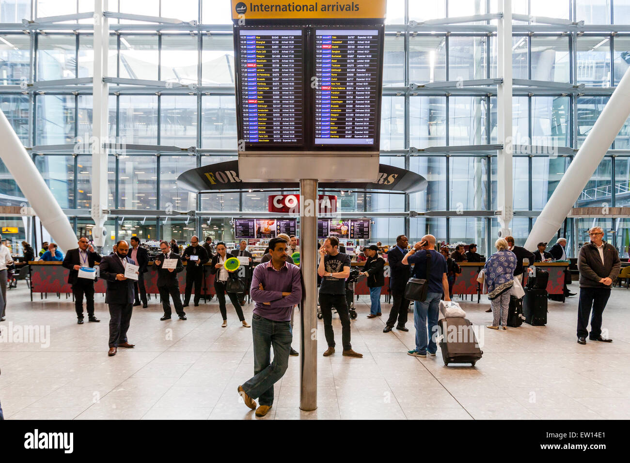 Airplane Arrivals Board In Terminal 5, Heathrow Airport, London ...
