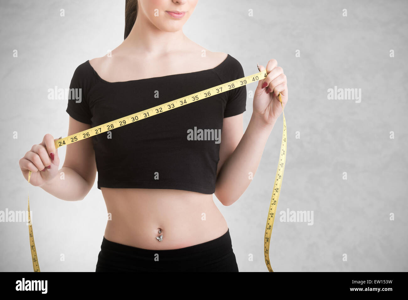 Woman measuring tape hi-res stock photography and images - Alamy