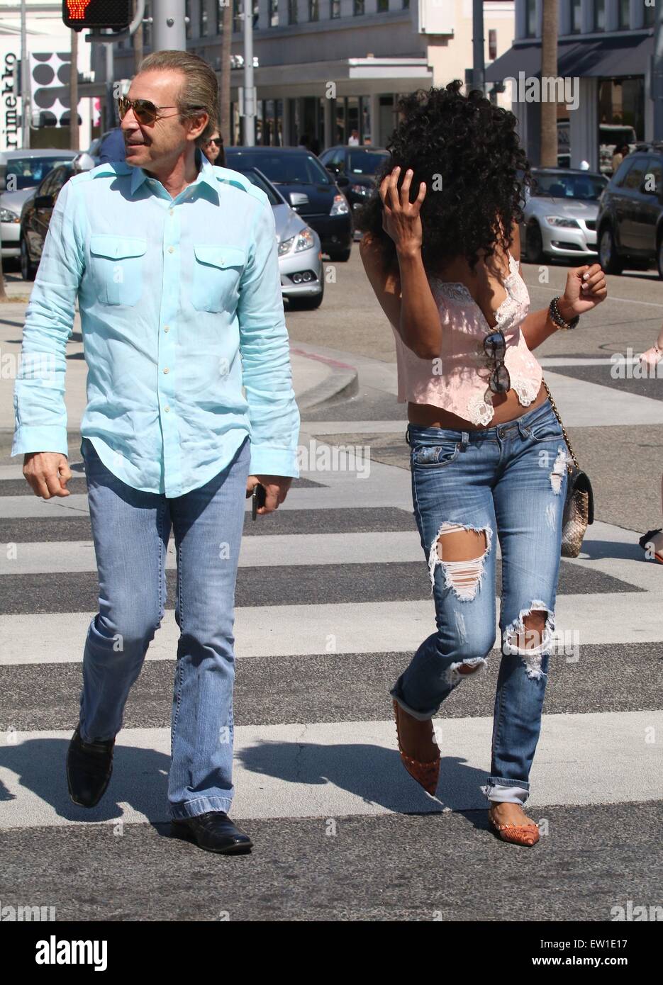 V. Stiviano and a male companion out and about in Beverly Hills ...