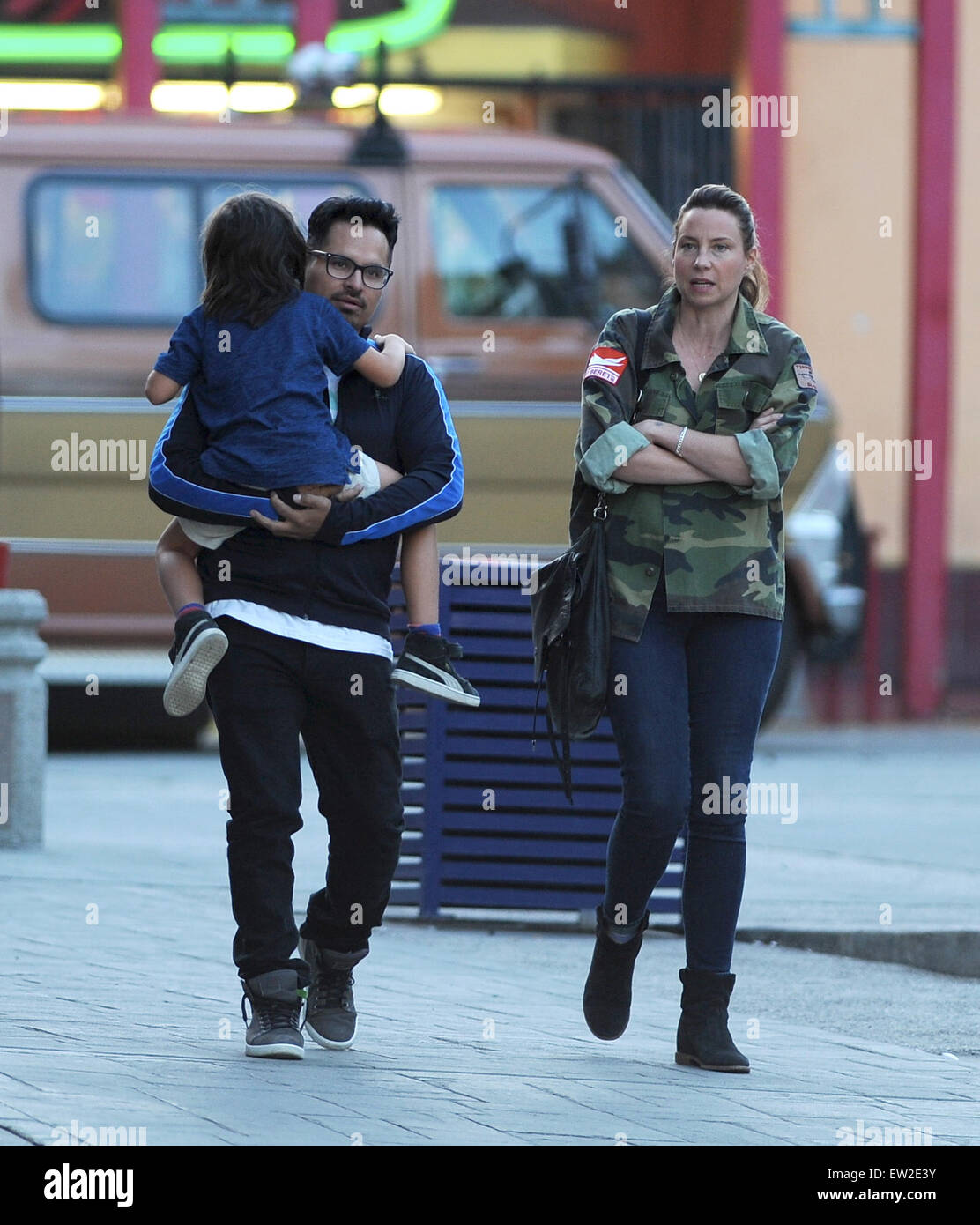 Michael Peña is visited on the set of 'Ant Man' by his wife Brie ...