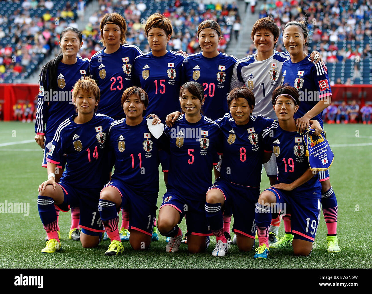 Winnipeg. 16th June, 2015. Players of Japan line up for group photos ...