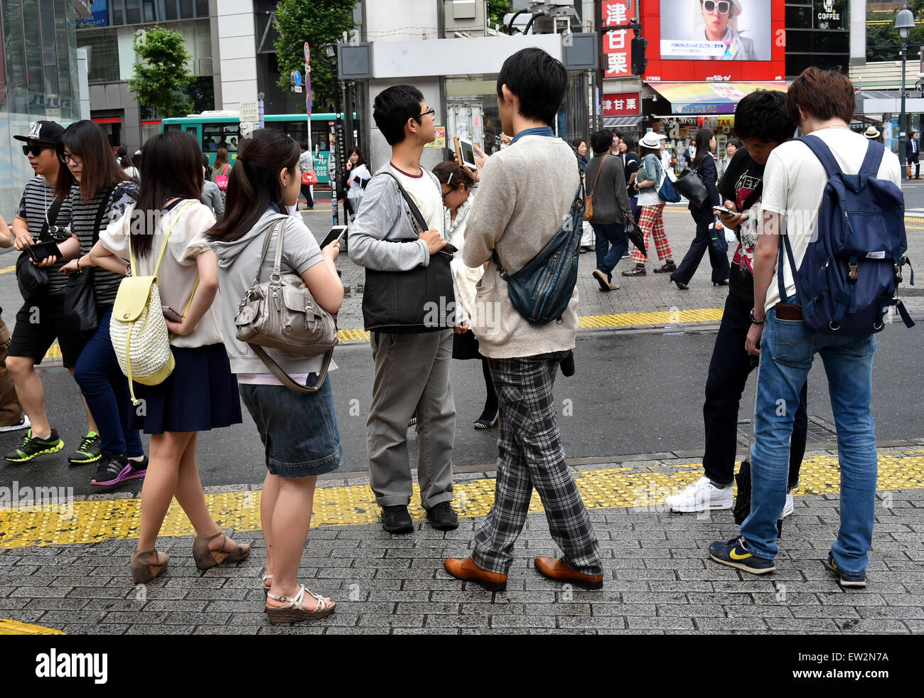 Tokyo, Japan. 17th June, 2015. Japanese youngsters hang around in ...
