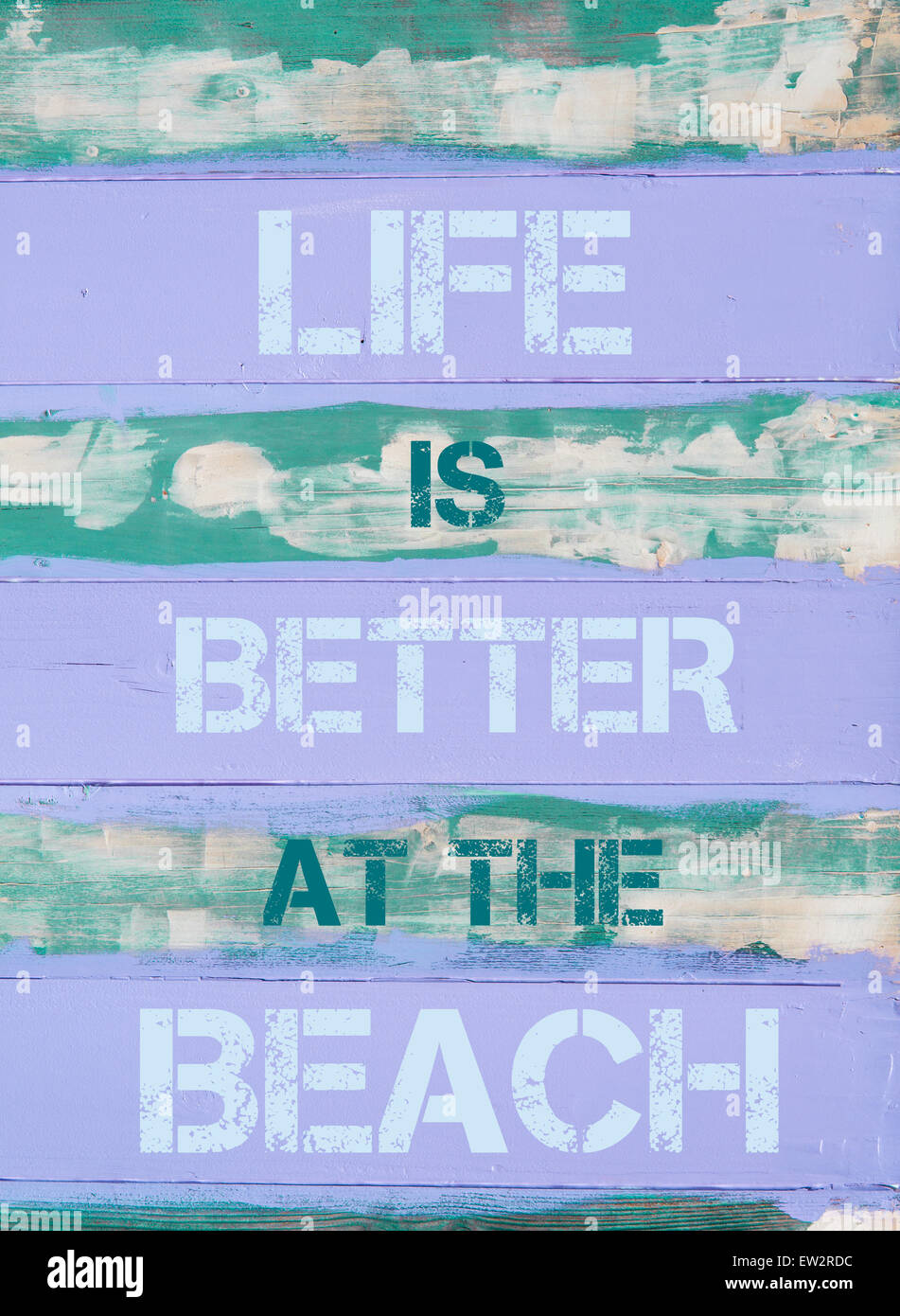 Concept image of LIFE IS BETTER AT THE BEACH motivational quote written ...