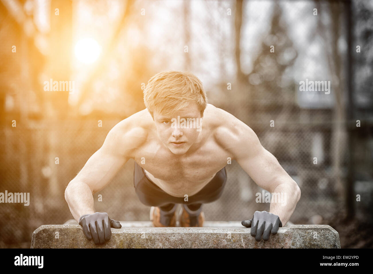 Streetworkout with sunset Stock Photo - Alamy