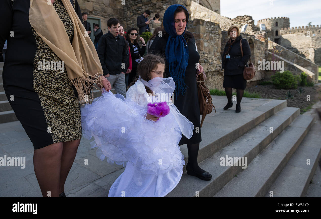 girl in first Holy Communion dress in Georgian Orthodox Svetitskhoveli ...