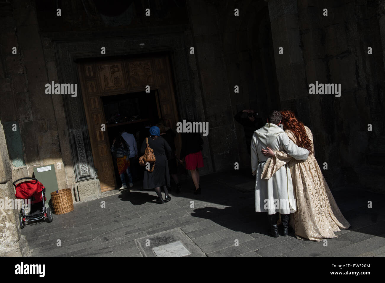 Wedding couple in traditional national costumes in Georgian Orthodox ...