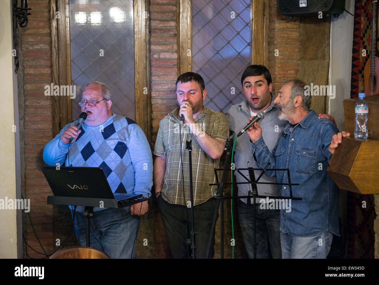 Local singers during show in restaurant in Kutaisi, Georgia Stock Photo ...
