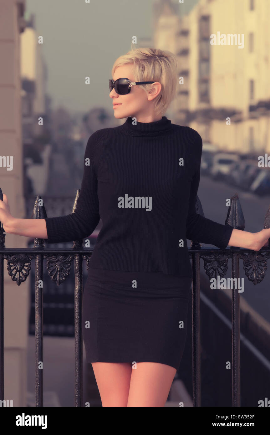 Woman in black outfit sunglasses hi-res stock photography and images ...