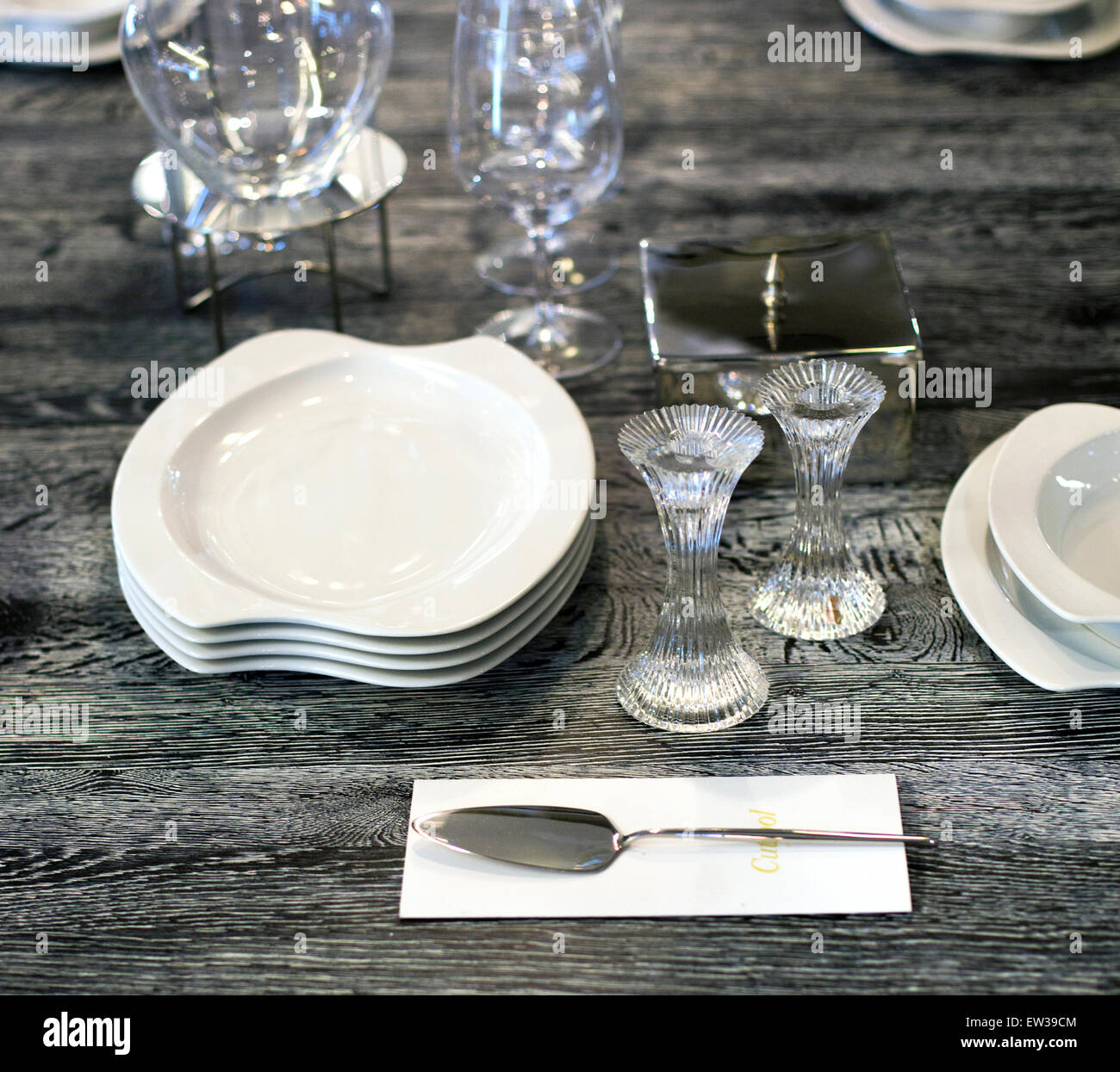 marble table with plates and glasses and candlesticks Stock Photo - Alamy