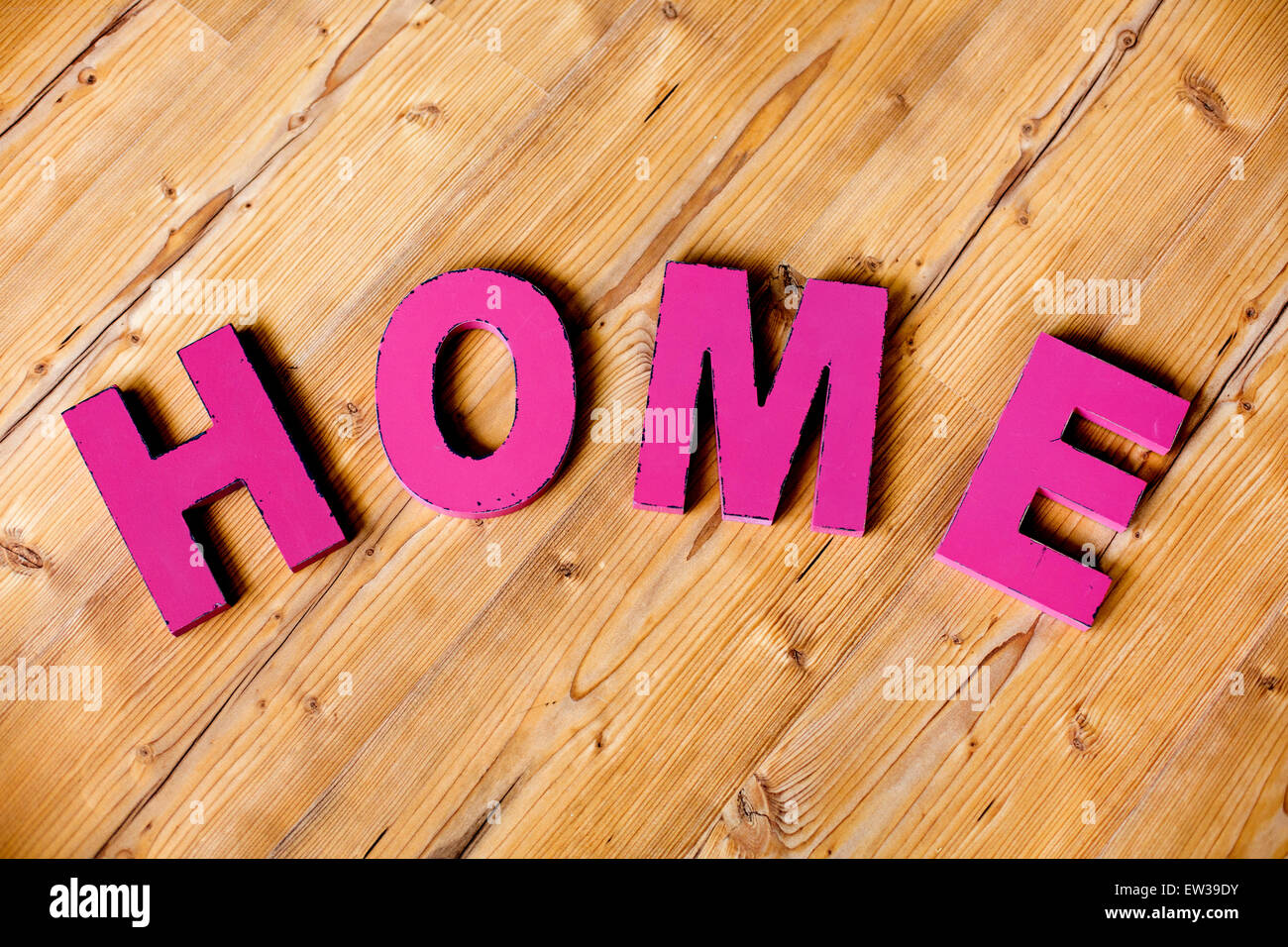 purple letters "home" on wood Stock Photo - Alamy