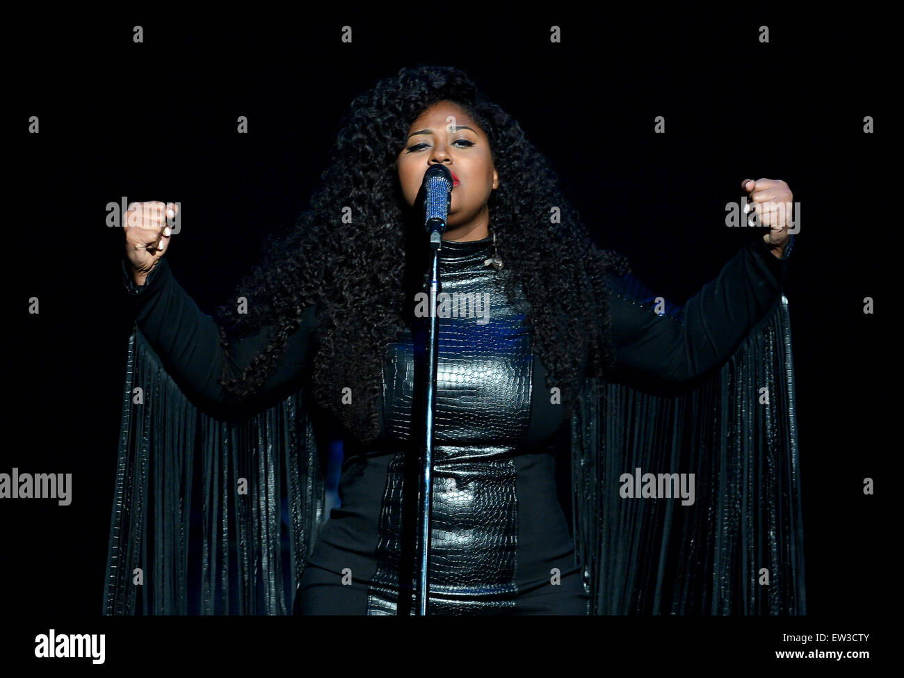 Jazmine Sullivan performing onstage during her 'Reality Show Tour' at ...