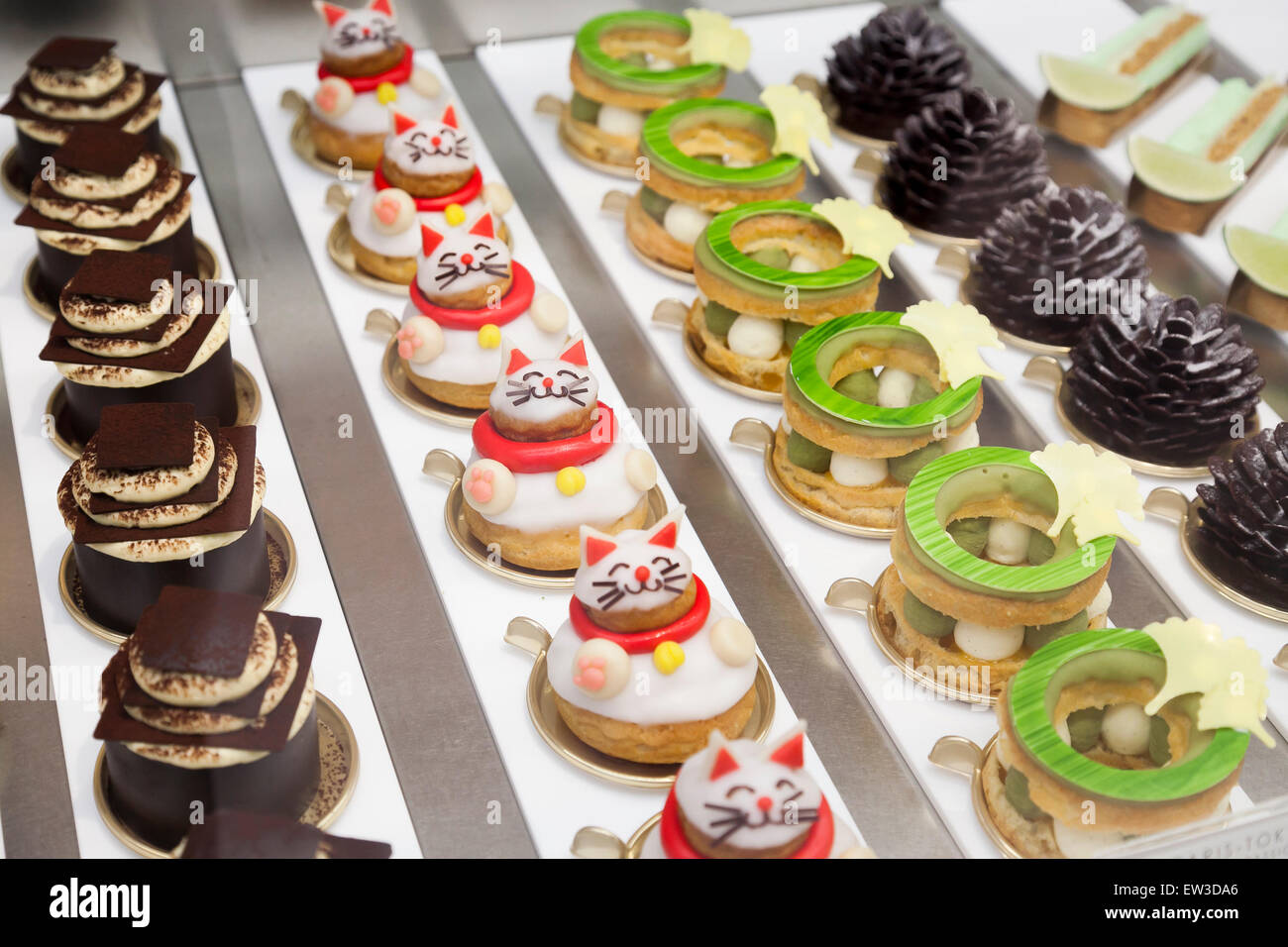 Various cakes on display during the pre-opening event for the new ...