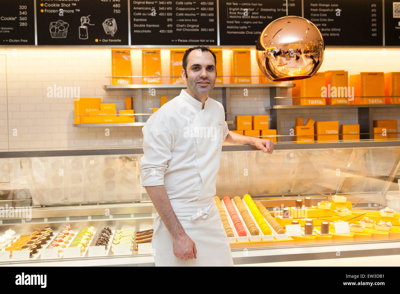 Chef Dominique Ansel poses for the cameras during the pre-opening event ...