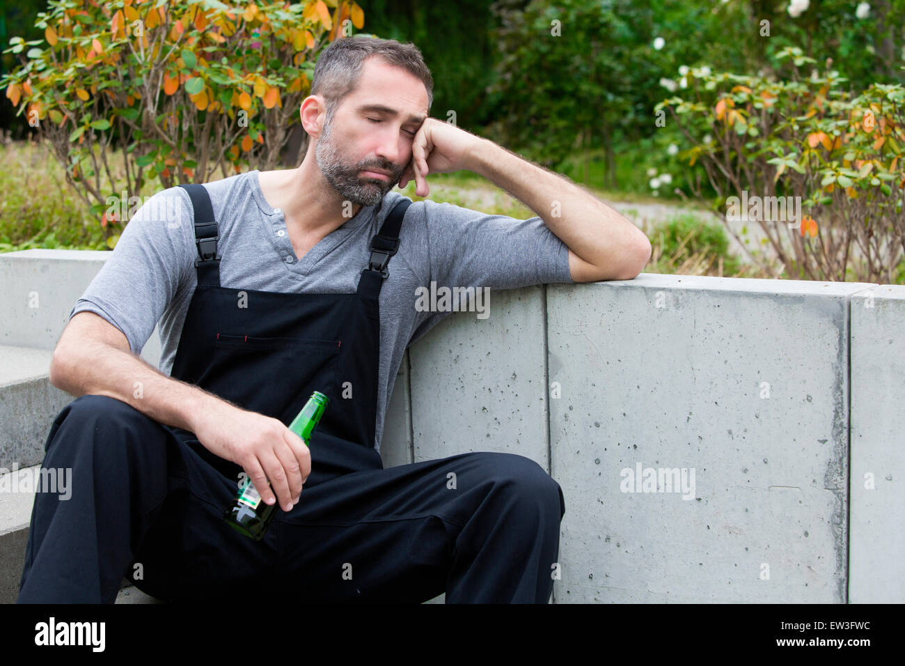 Workman sitting hi-res stock photography and images - Alamy