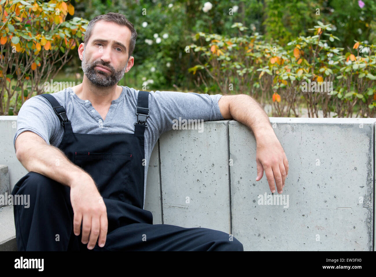 Workman sitting hi-res stock photography and images - Alamy