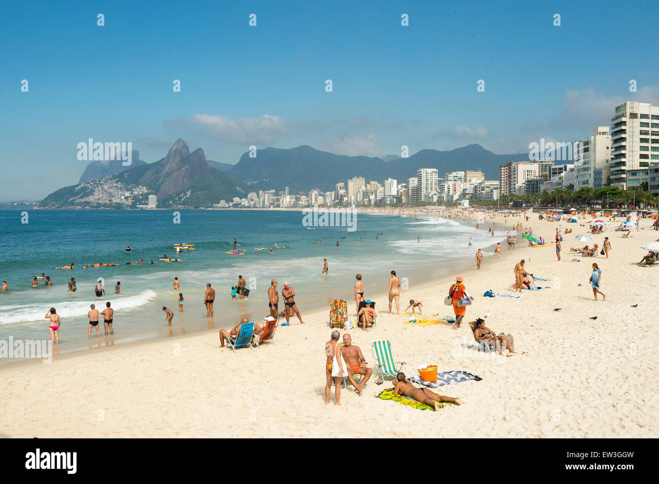 RIO DE JANEIRO, BRAZIL - MARCH 01, 2015: Beachgoers relax on Ipanema ...
