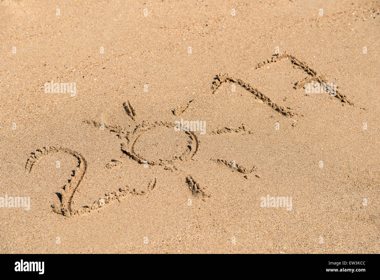 Year 2017 Written On Beach Sand Stock Photo - Alamy