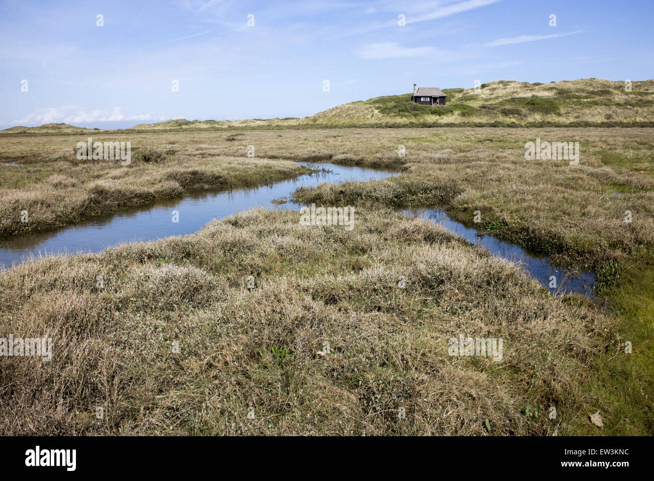 Looking over salt marsh to the Wardens cottage on Scolt Head Island ...