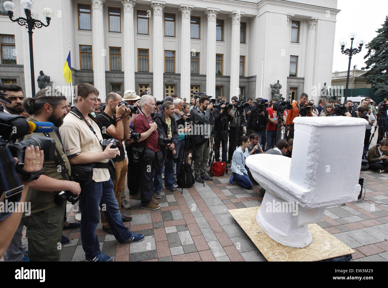Kiev, Ukraine. 17th June, 2015. A journalists look at a fake toilet ...