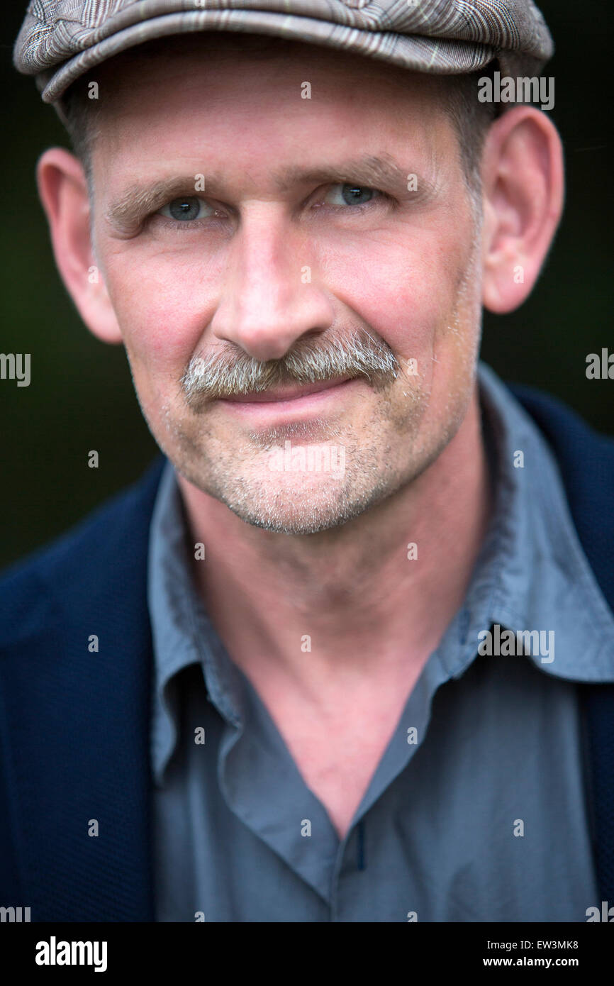 Portrait of a handsome man with a cap Stock Photo - Alamy