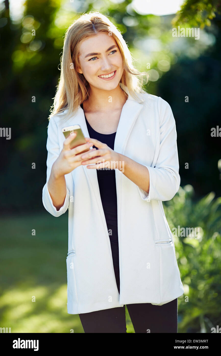 Woman holding iphone 6 hi-res stock photography and images - Alamy
