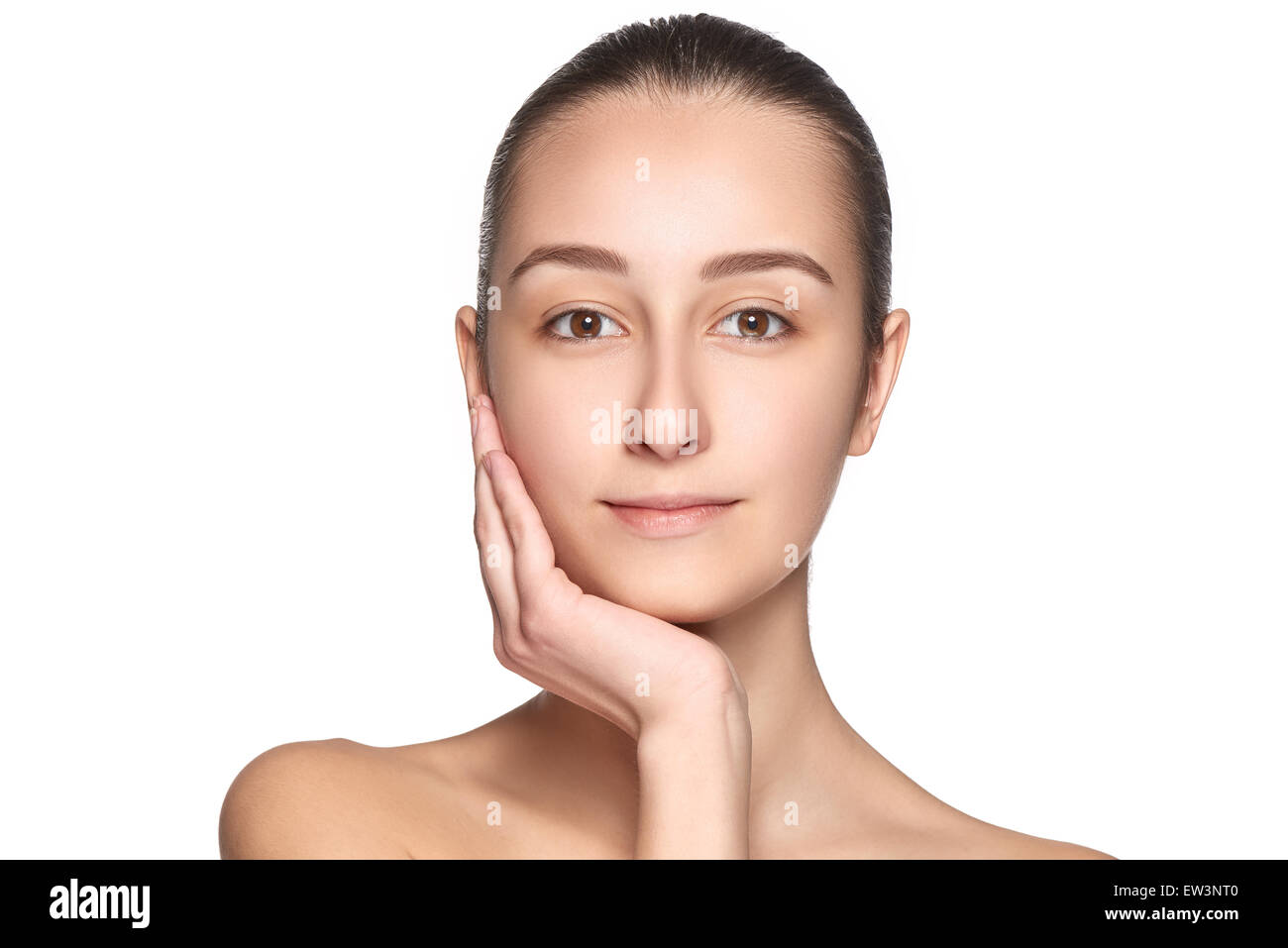 Portrait Of Beautiful Girl Stroking Her Face With Healthy Skin Stock