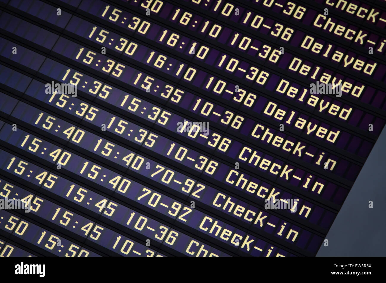 Flights information board in airport terminal Stock Photo - Alamy
