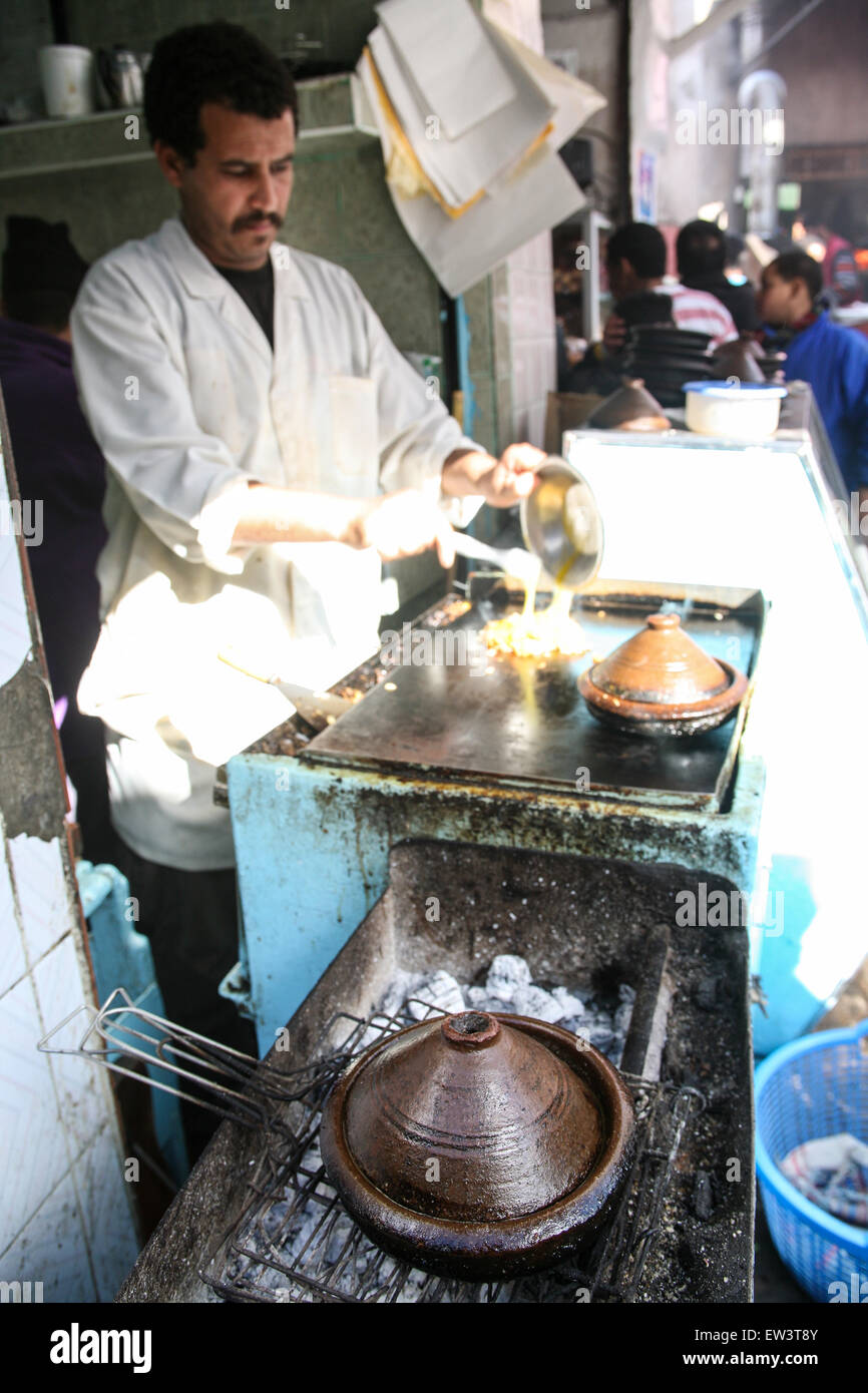 traditional,Moroccan,food,Cooking of, Tajine, stew,pot at street stall ...