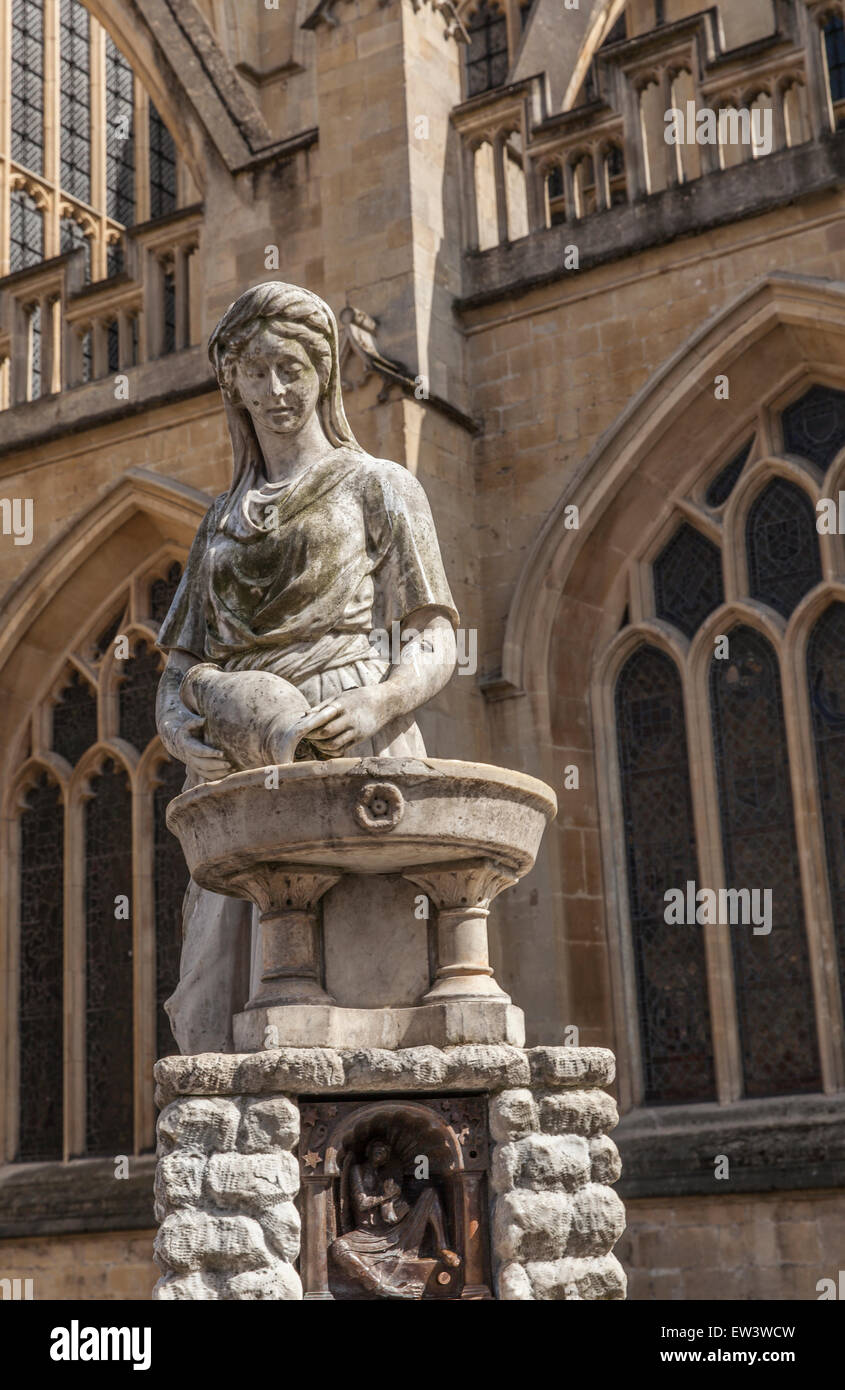 Statue of woman with a jug of water by a fountain in front of Bath ...