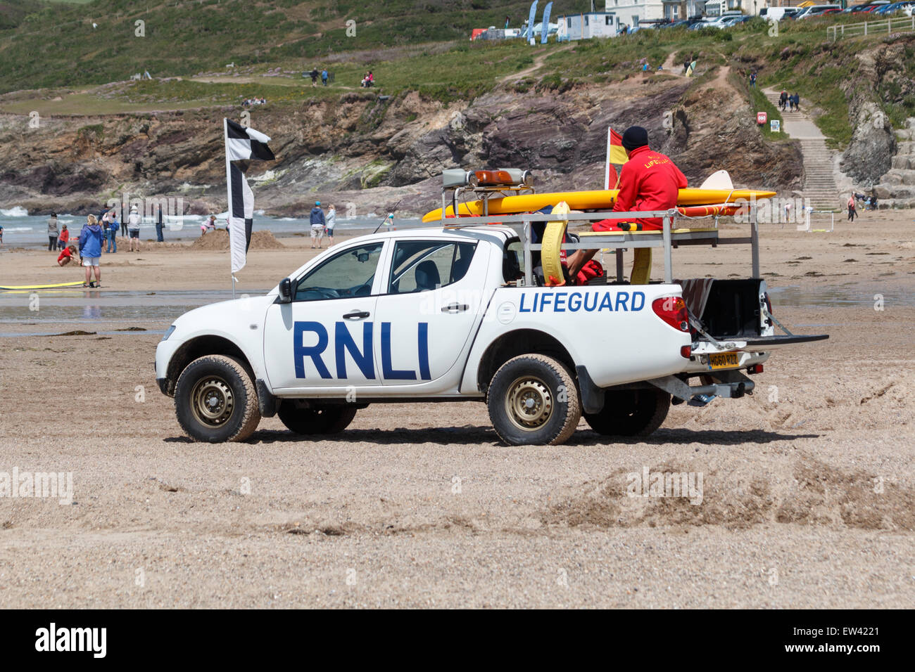 RNLI lifeguard post on Polzeath beach, Cornwall, UK. The lifeguards are ...